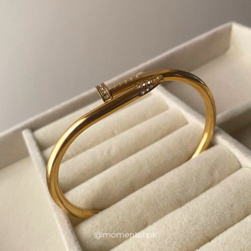 Shop Stone Nail Handcuff in Gold | Momental